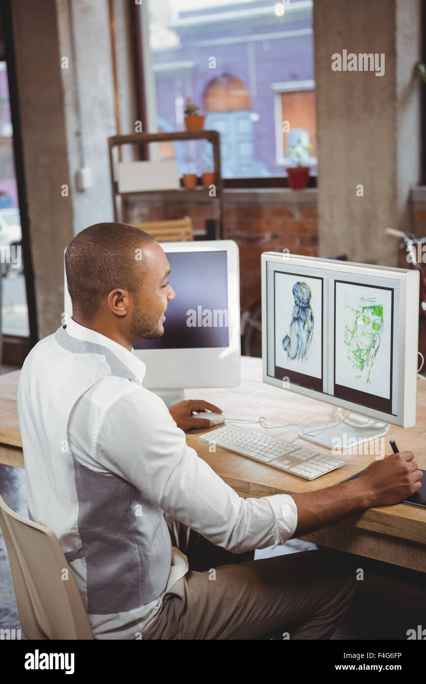 Cartoonist working at desk hi-res stock photography and images - Alamy