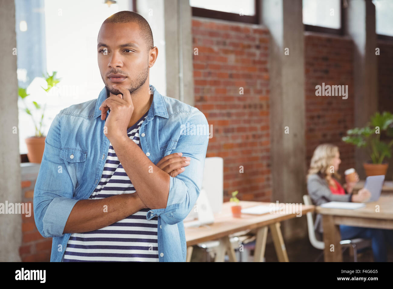 Business man standing office hi-res stock photography and images - Alamy