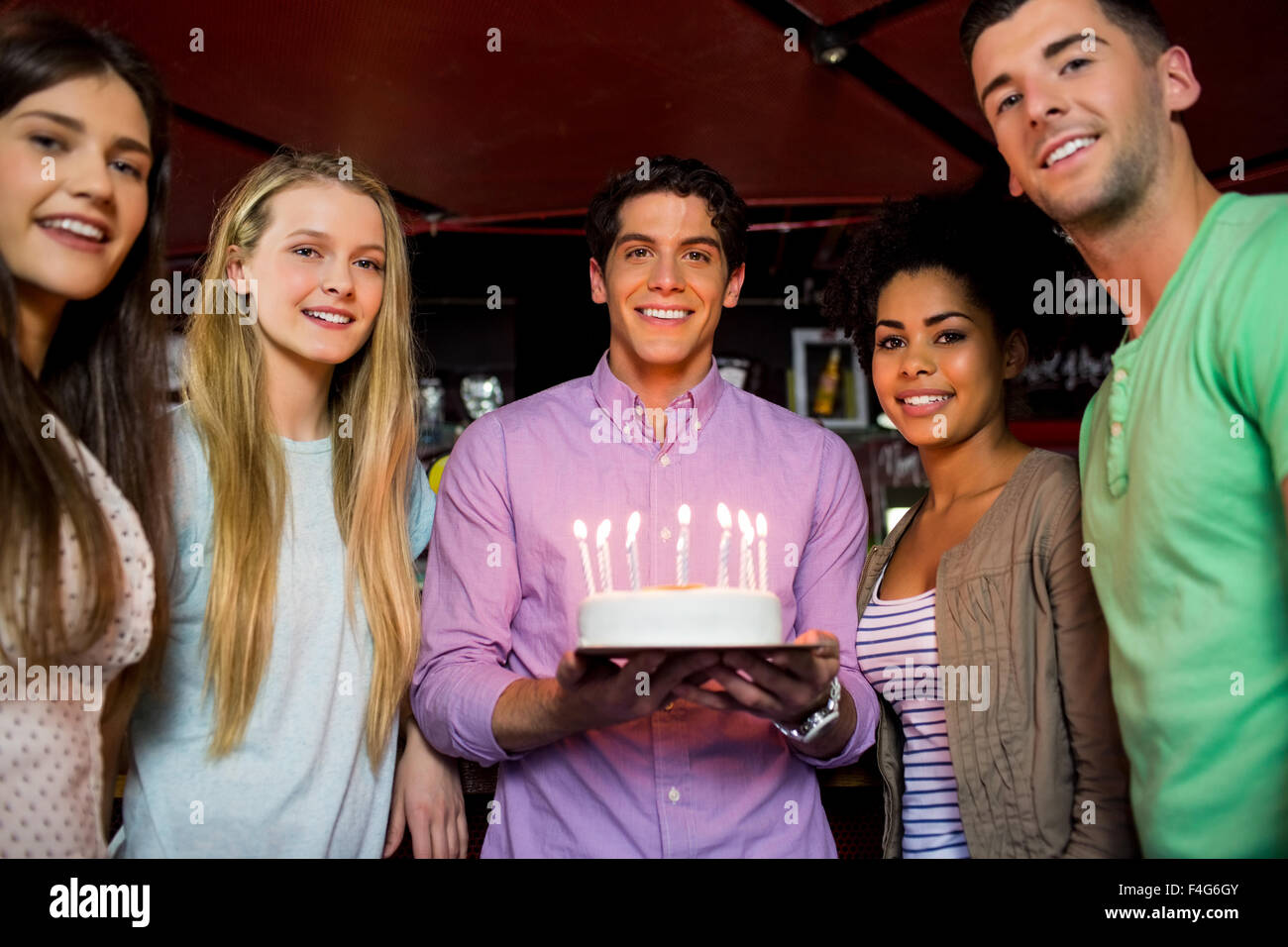 Friends celebrating birthday together Stock Photo - Alamy