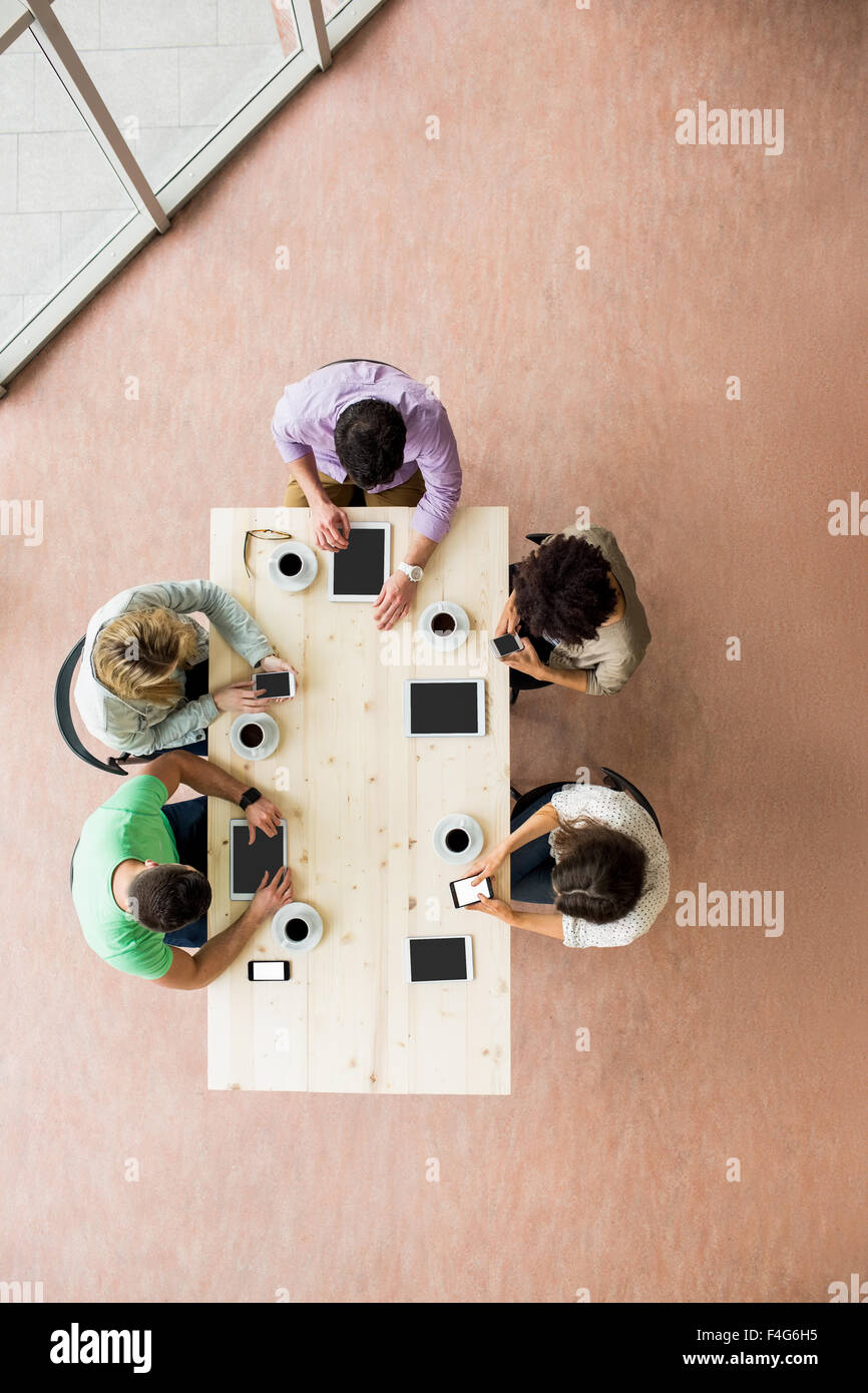 Overhead working together hi-res stock photography and images - Alamy