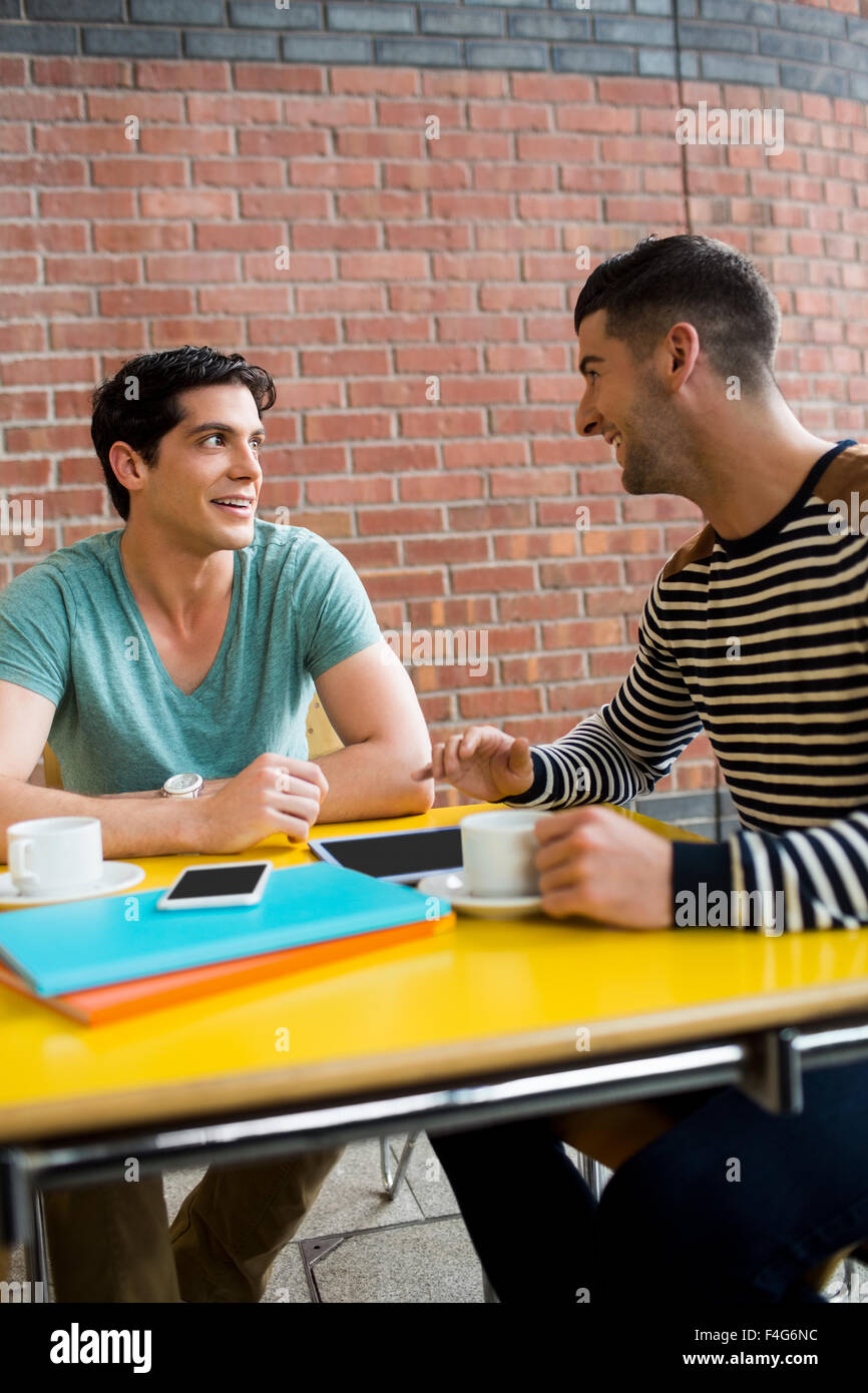 Students chatting in the cafe Stock Photo - Alamy