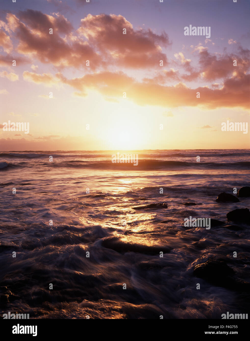 California, San Diego, Sunset Cliffs, Sunset over waves on the Pacific ...