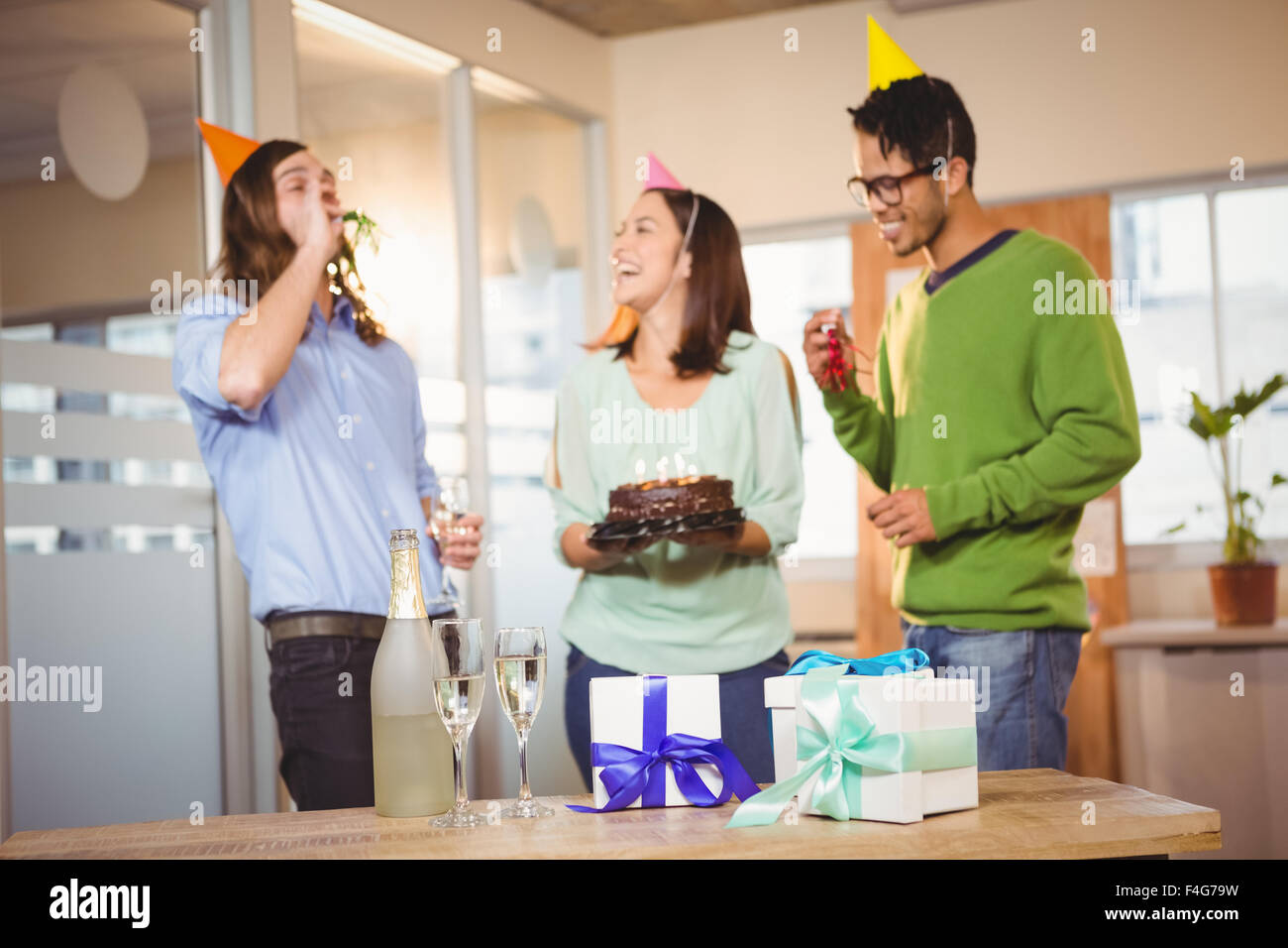 Business people enjoying birthday party Stock Photo - Alamy