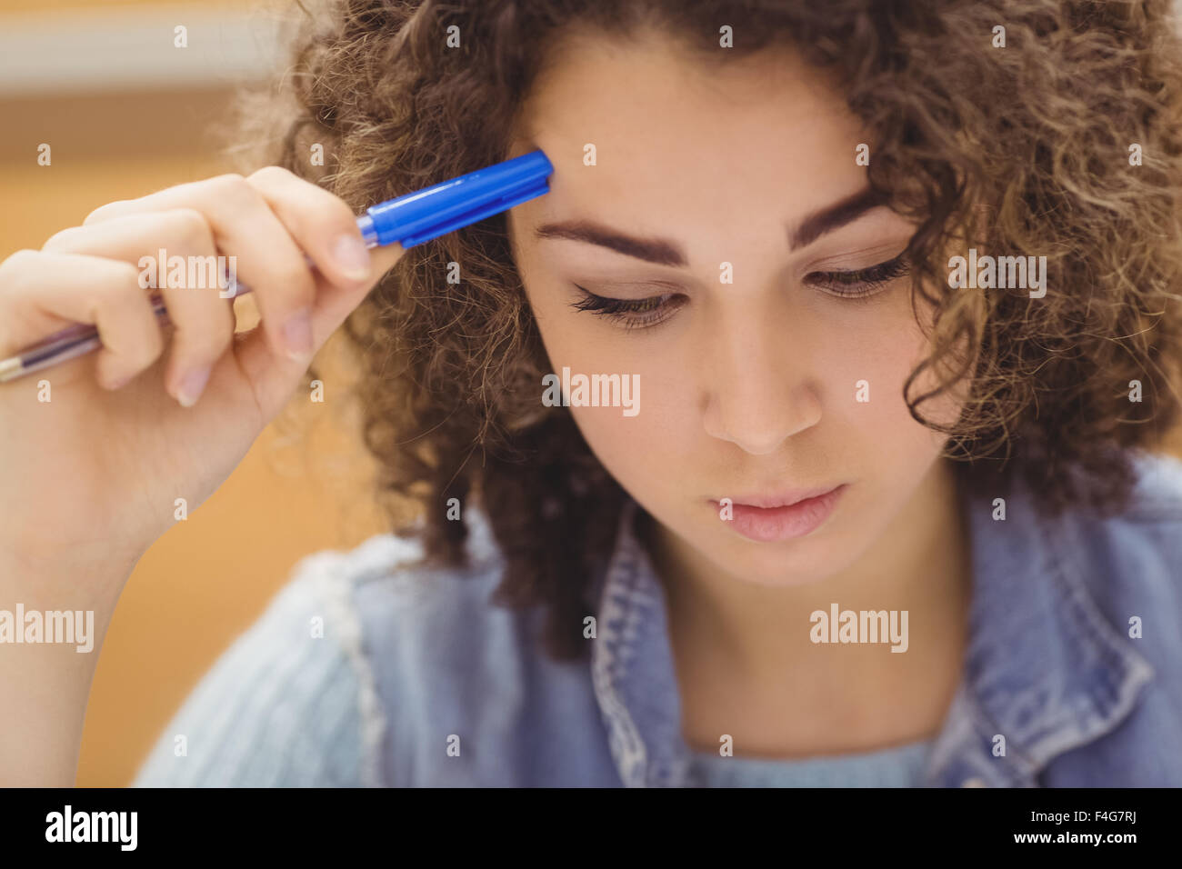 Pretty student in lecture hall Stock Photo - Alamy