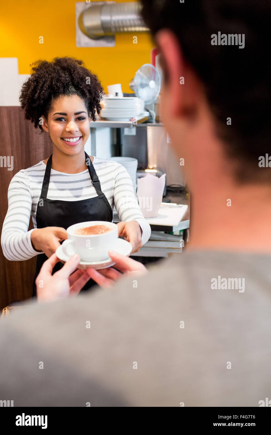 Waitress serving lunch to customer Stock Photo - Alamy