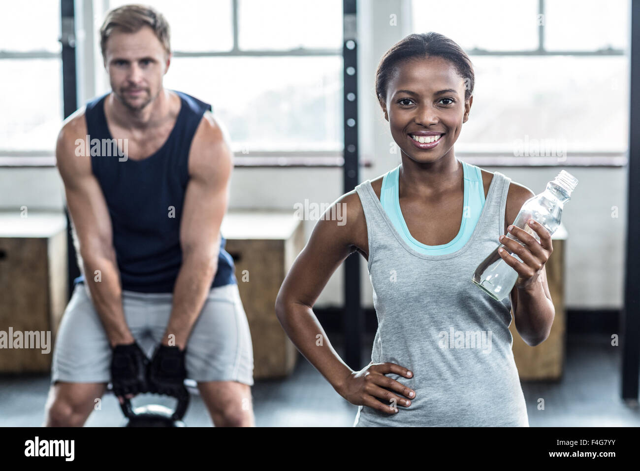 Female athlete drinking water standing hi-res stock photography and ...