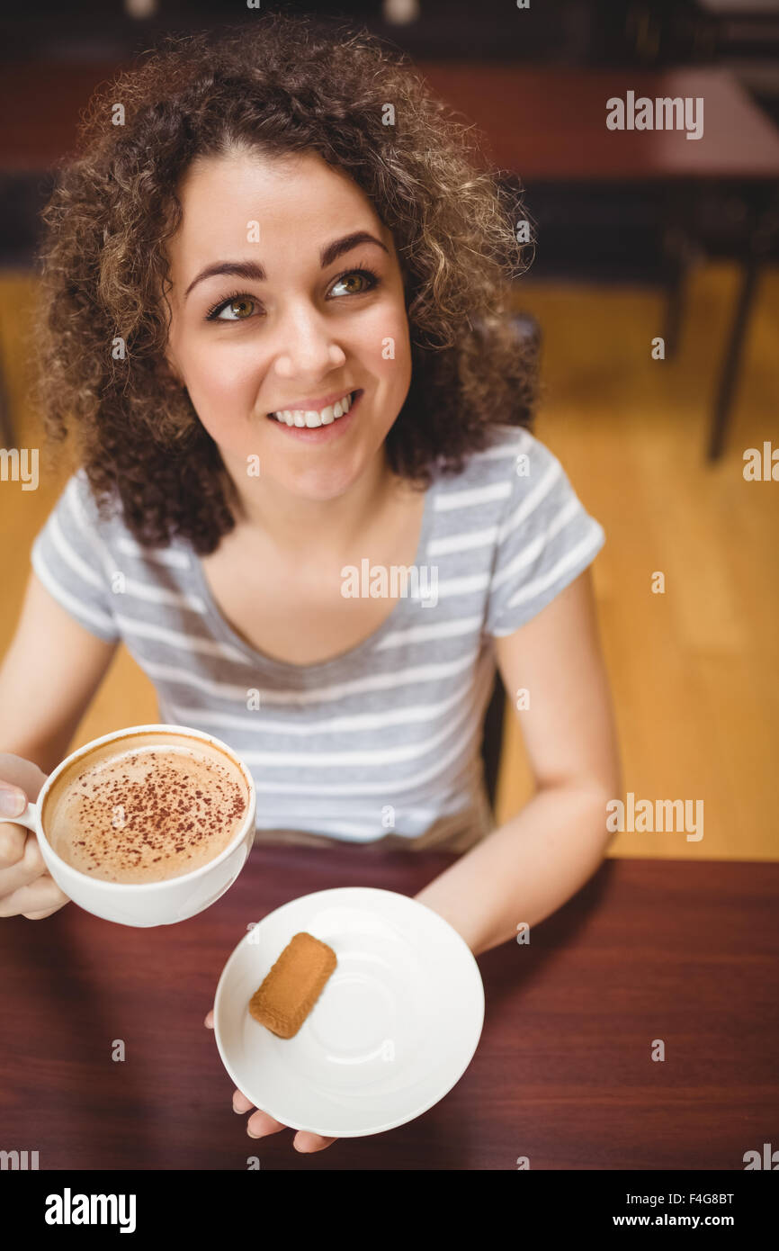 Pretty student having a coffee Stock Photo - Alamy
