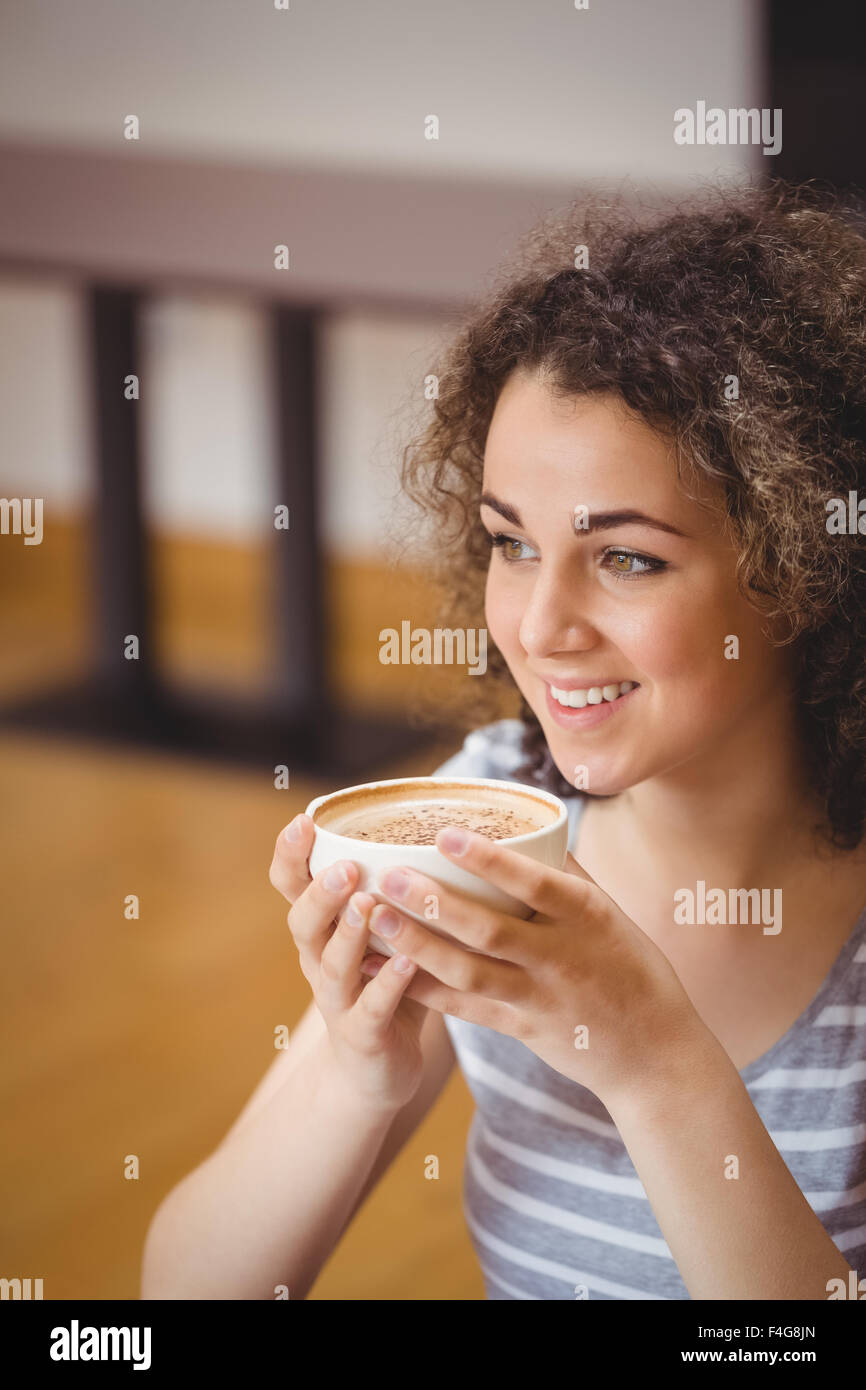 Pretty student having a coffee Stock Photo - Alamy