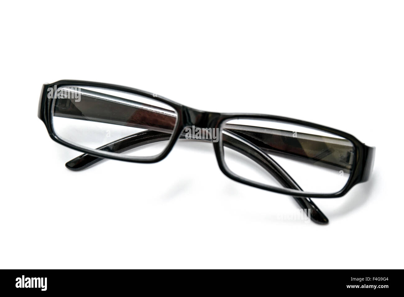 Black reading glasses isolated on white Stock Photo - Alamy