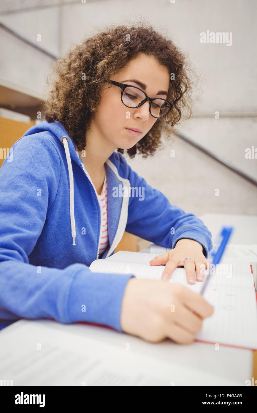 Concentrated student writing notes hi-res stock photography and images ...