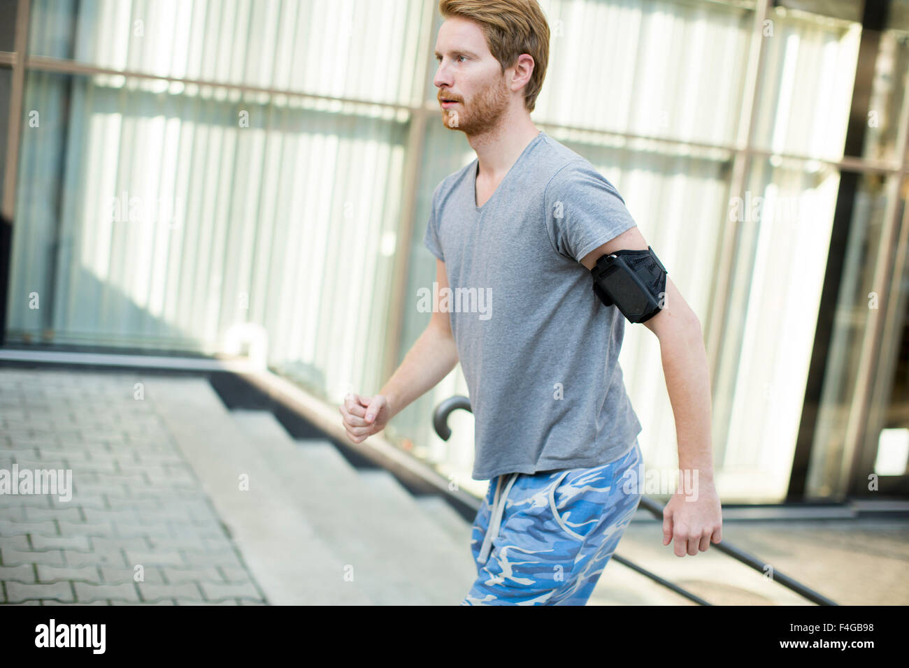 Running male urban hi-res stock photography and images - Alamy