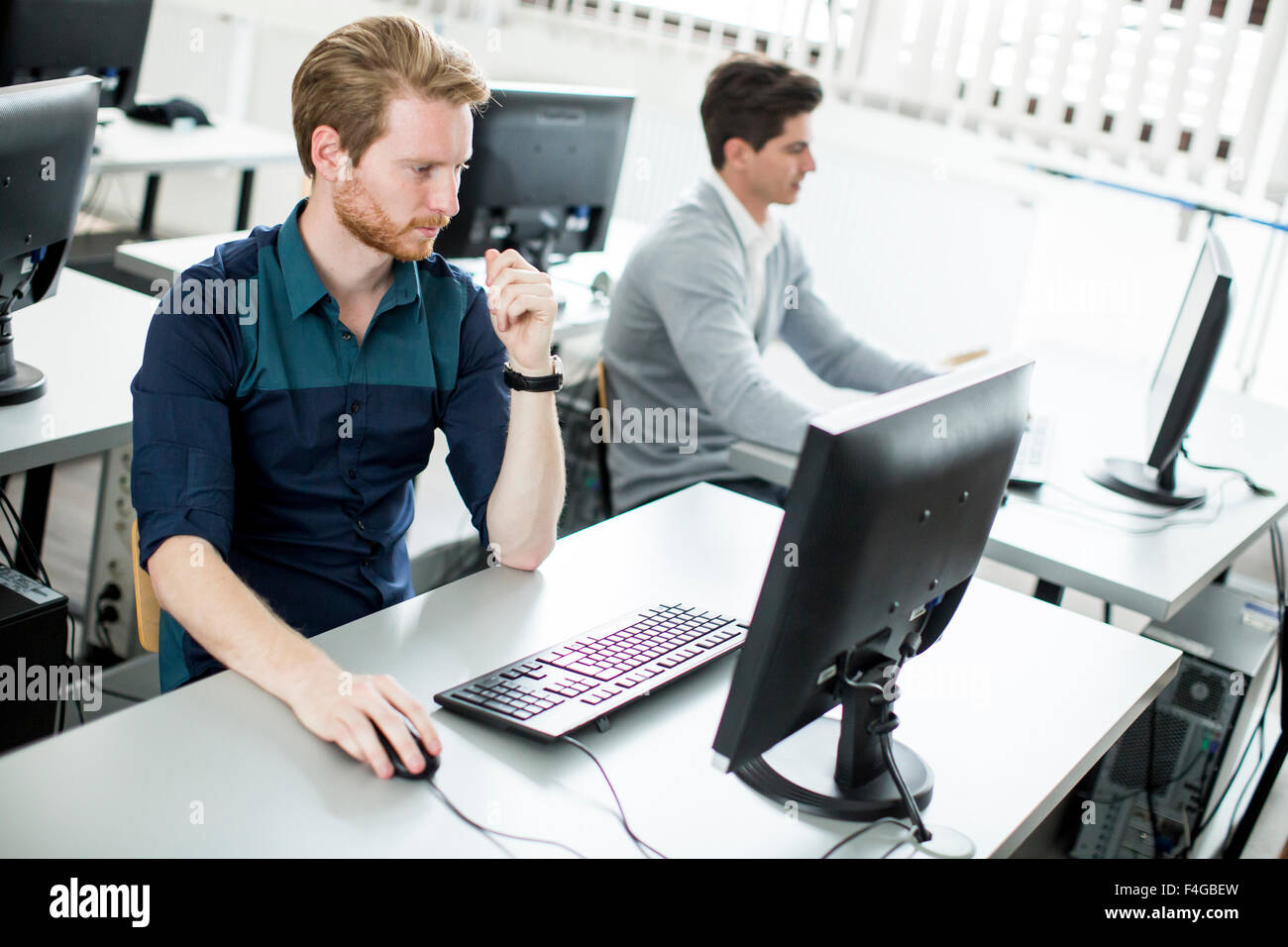 Young people in the classroom Stock Photo - Alamy