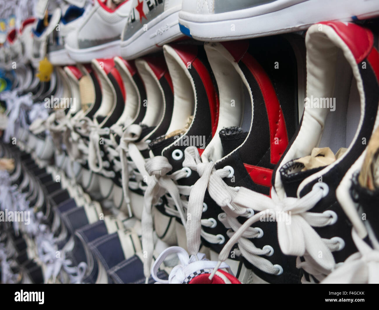 Footwear stall displaying shoes Stock Photo - Alamy
