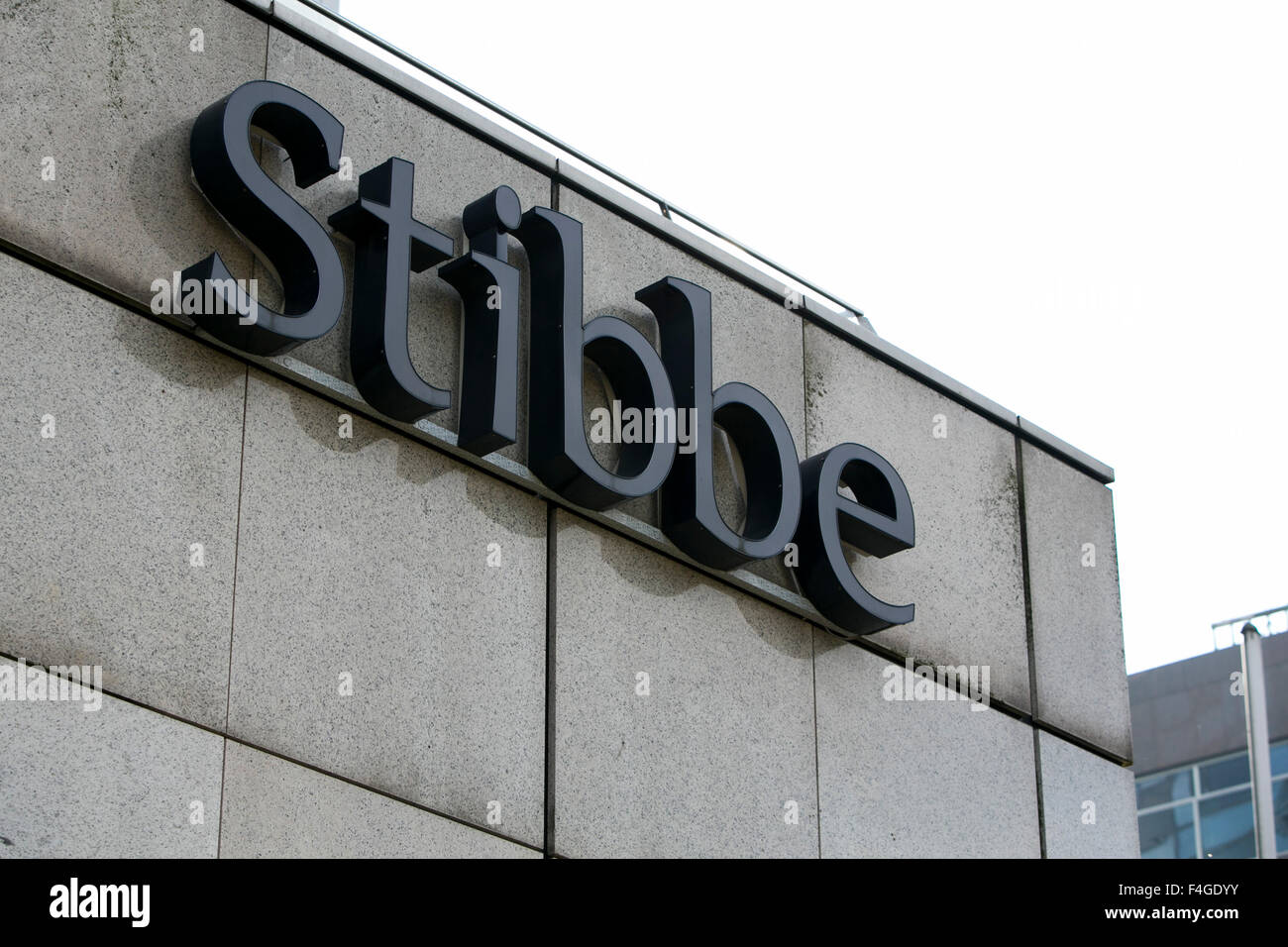 A logo sign outside of an office building occupied by Stibbe in ...