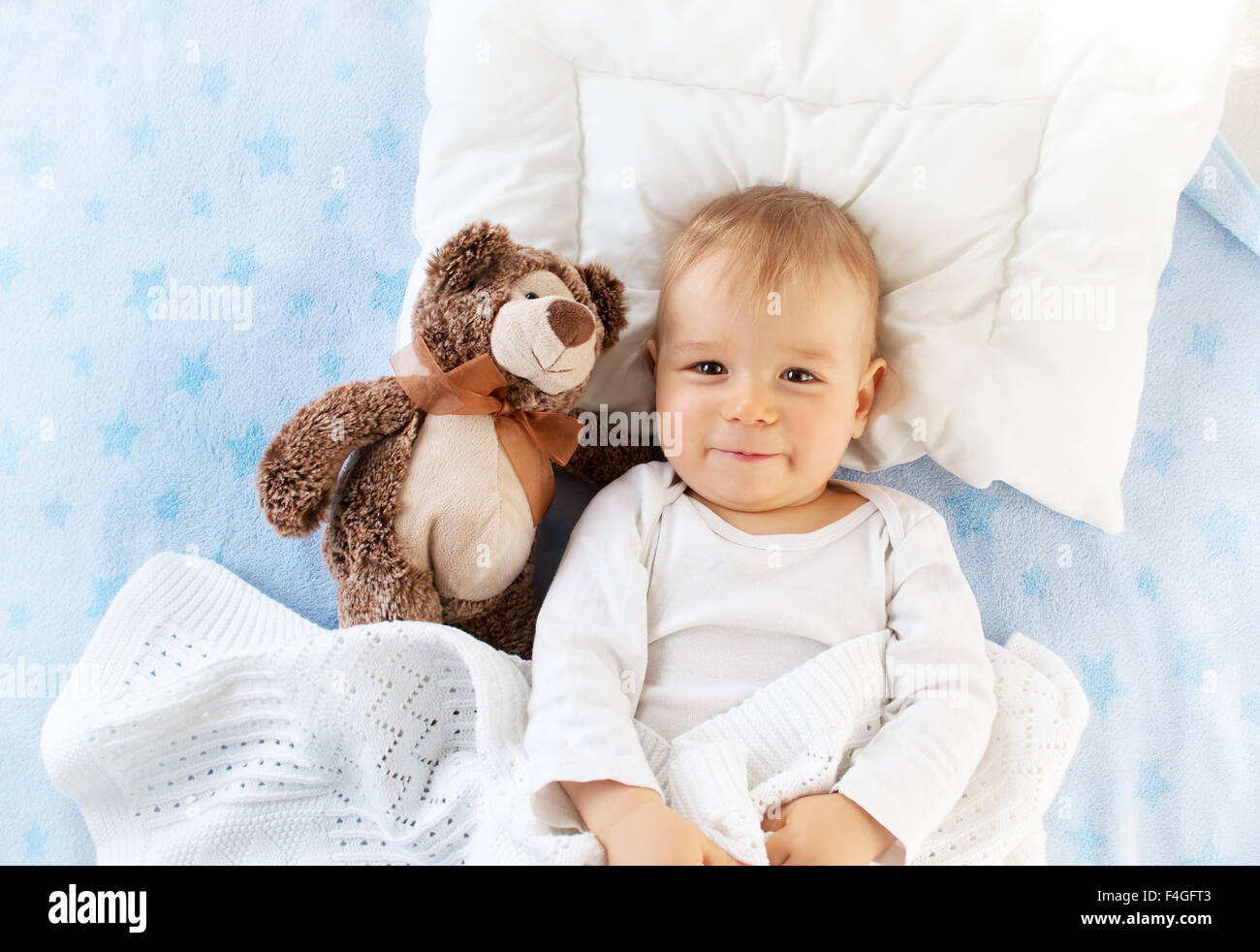 One year old baby with a teddy bear Stock Photo - Alamy