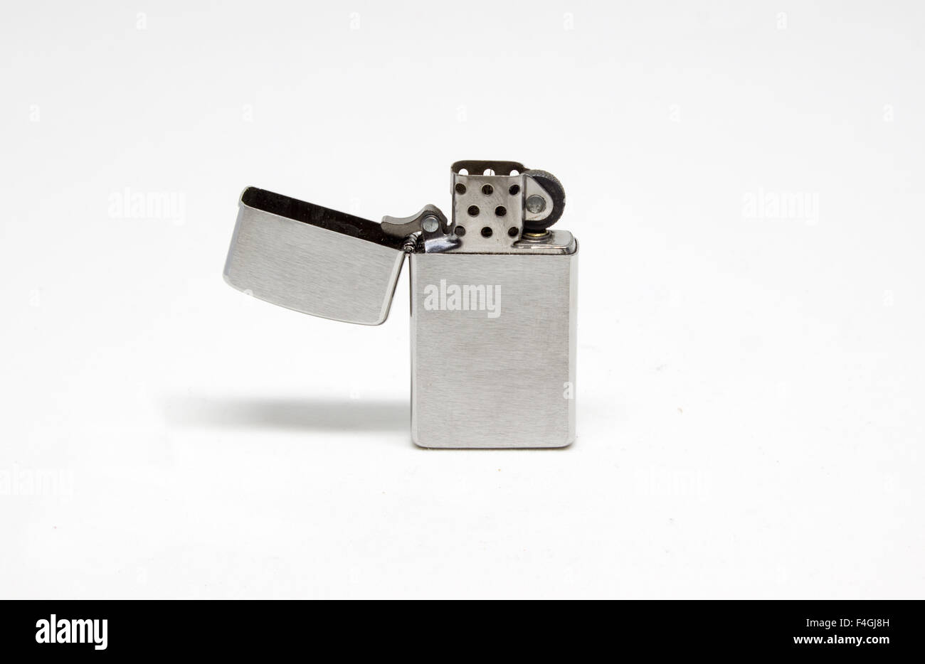 Open brushed metal lighter isolated on white background Stock Photo - Alamy