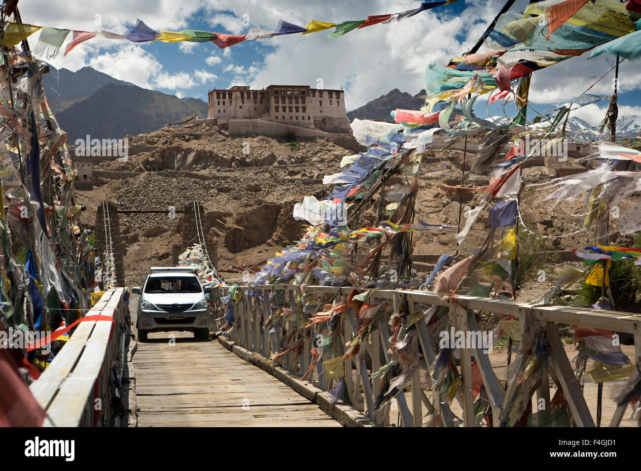 India, Jammu & Kashmir, Ladakh, Stakna, car crossing narrow suspension ...