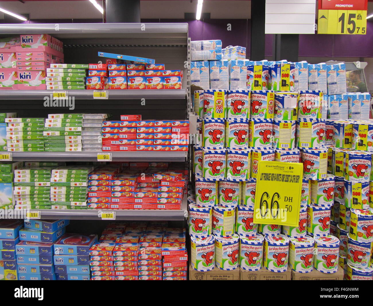 Shelves of cheese and chocolate in French supermarket, Carrefour in ...