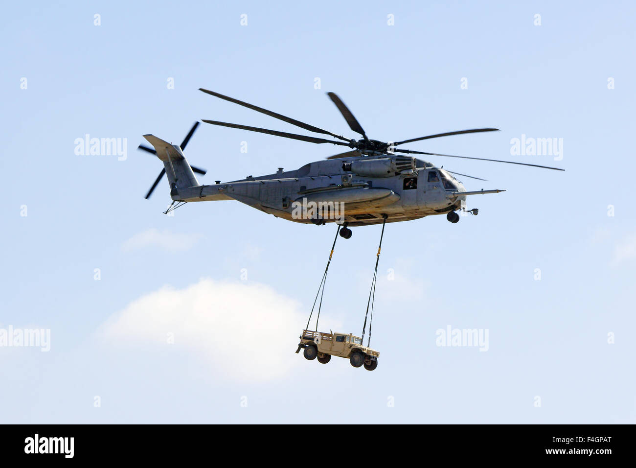 Helicopter CH-53 Super Stallion lifting a hummer vehicle at 2015 Air ...