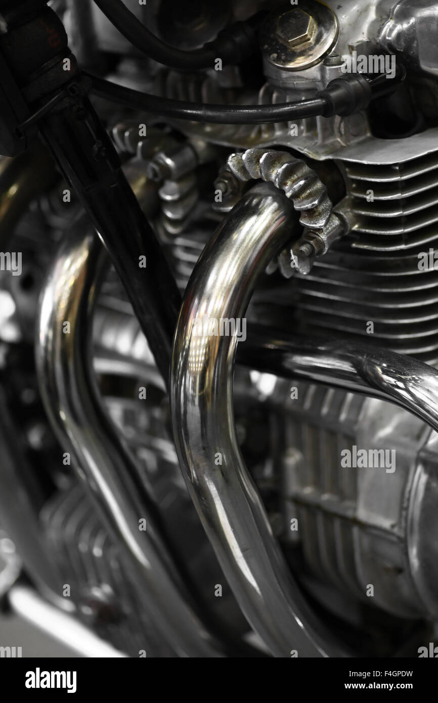 Detail of a motorcycle exhaust pipes and cylinders Stock Photo - Alamy