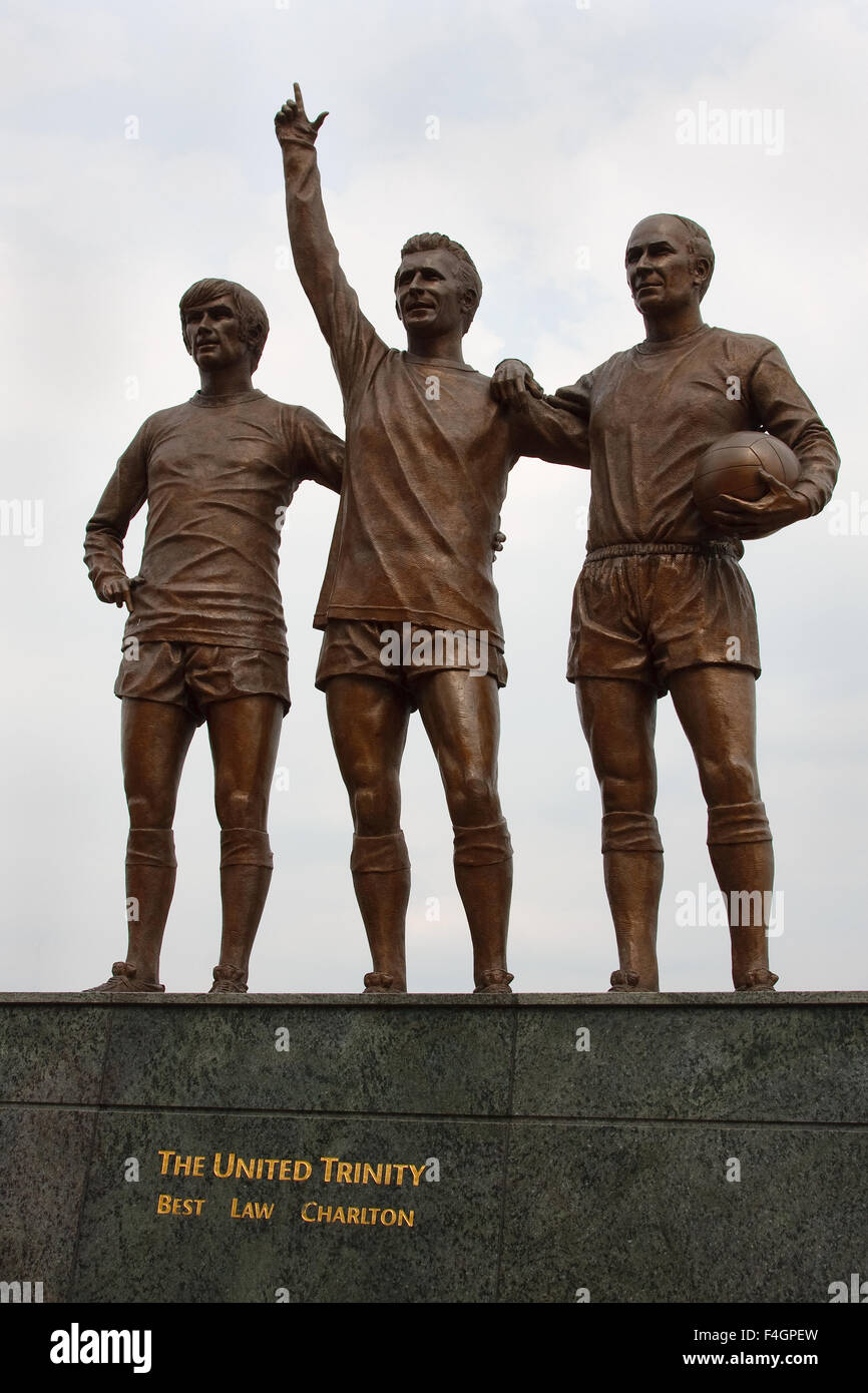 A statue of George Best, Dennis Law and Bobby Charlton, outside Old ...