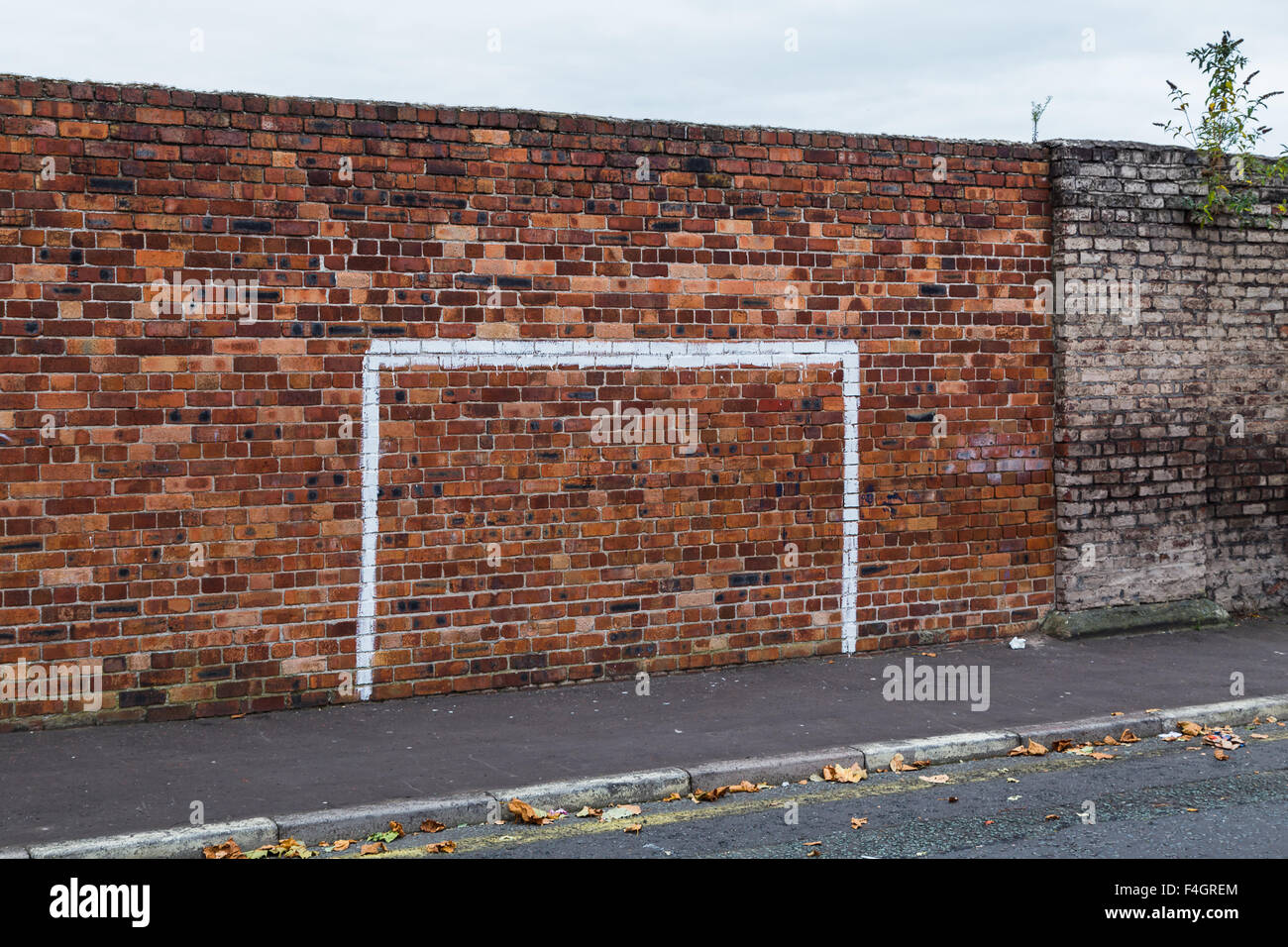 Goal posts painted on a wall in Liverpool Stock Photo - Alamy