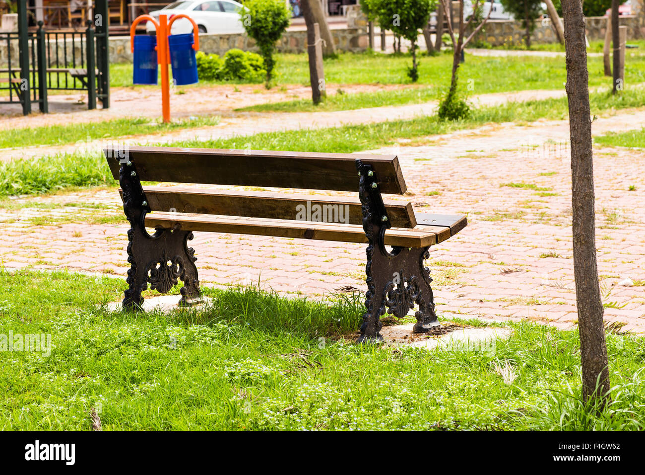 wooden bench at a park Stock Photo - Alamy
