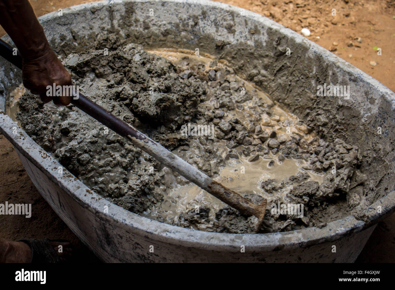 Cement or mortar is inside cement mixer. Cement or mortar is mix Stock ...