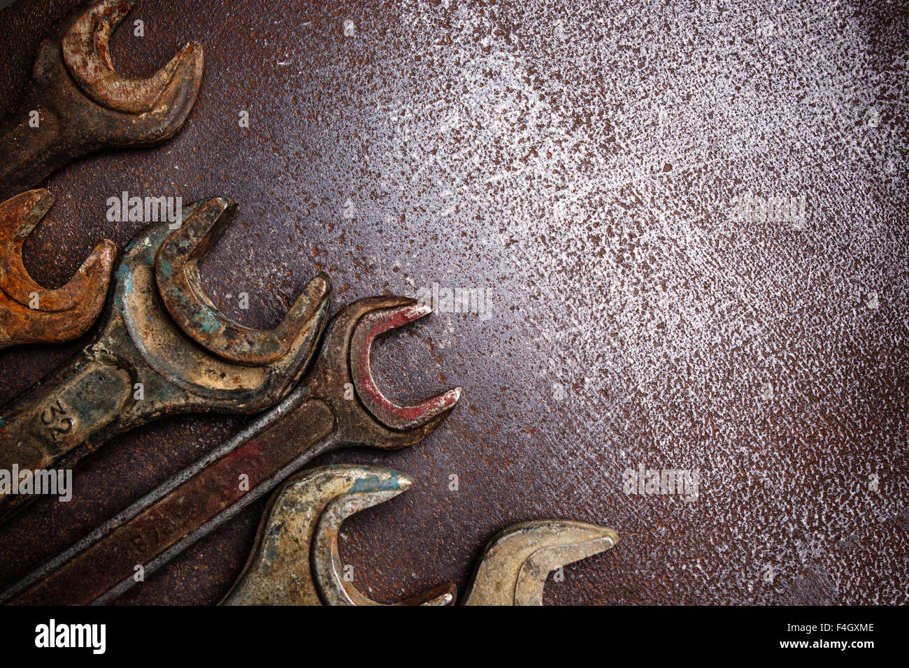 Old rusty wrenches on a metal table Stock Photo - Alamy