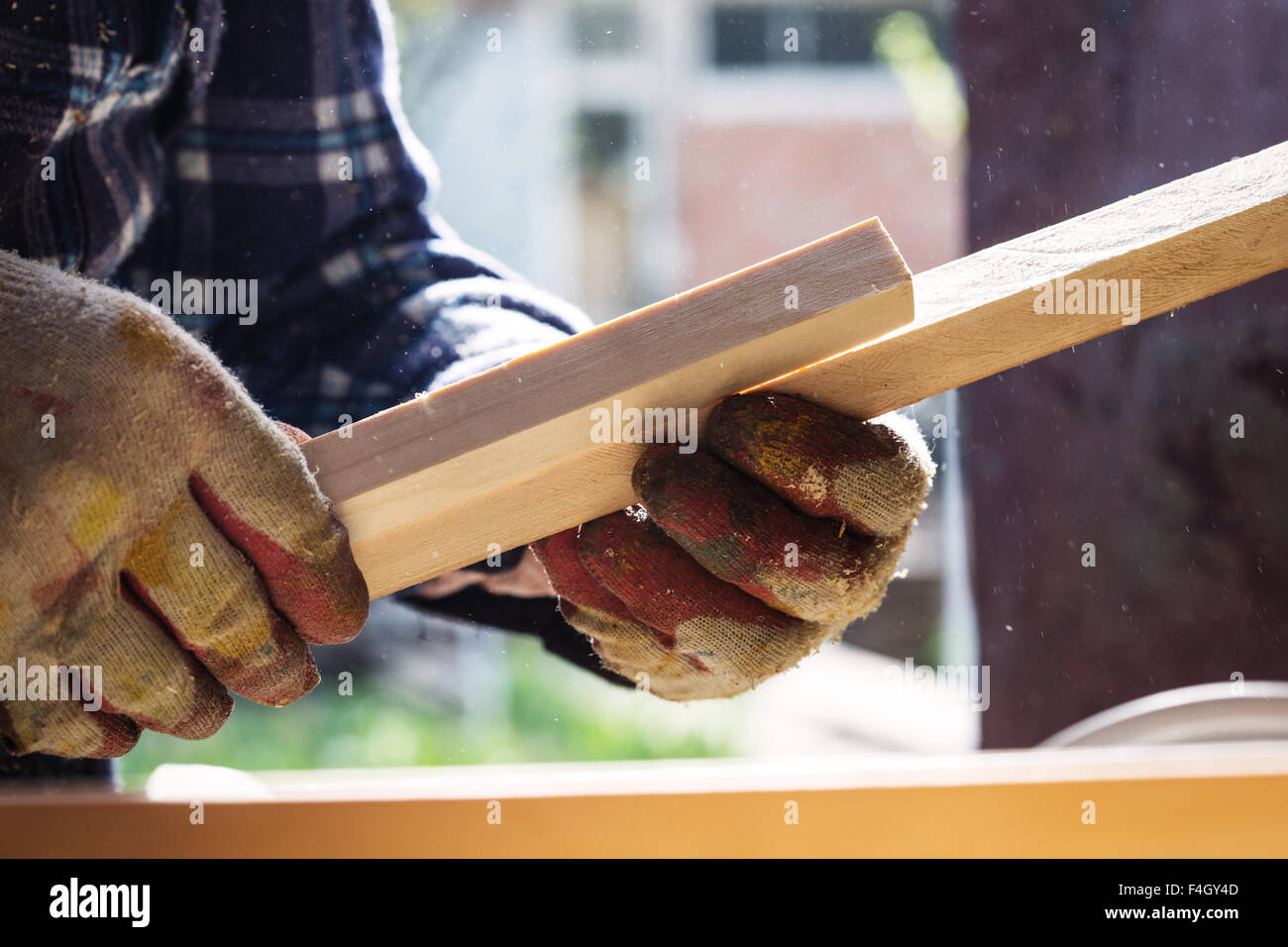 Carpenter working with wood, close up photo Stock Photo - Alamy