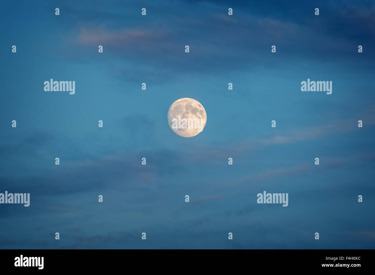 Full moon with clouds Stock Photo - Alamy