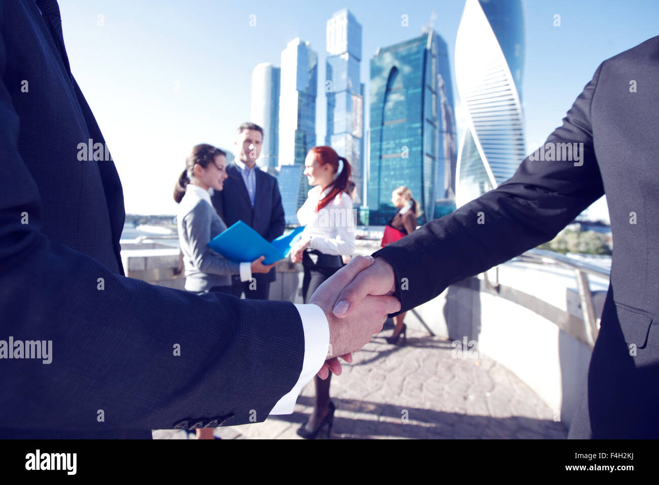 Business handshake deal finalized group hi-res stock photography and ...
