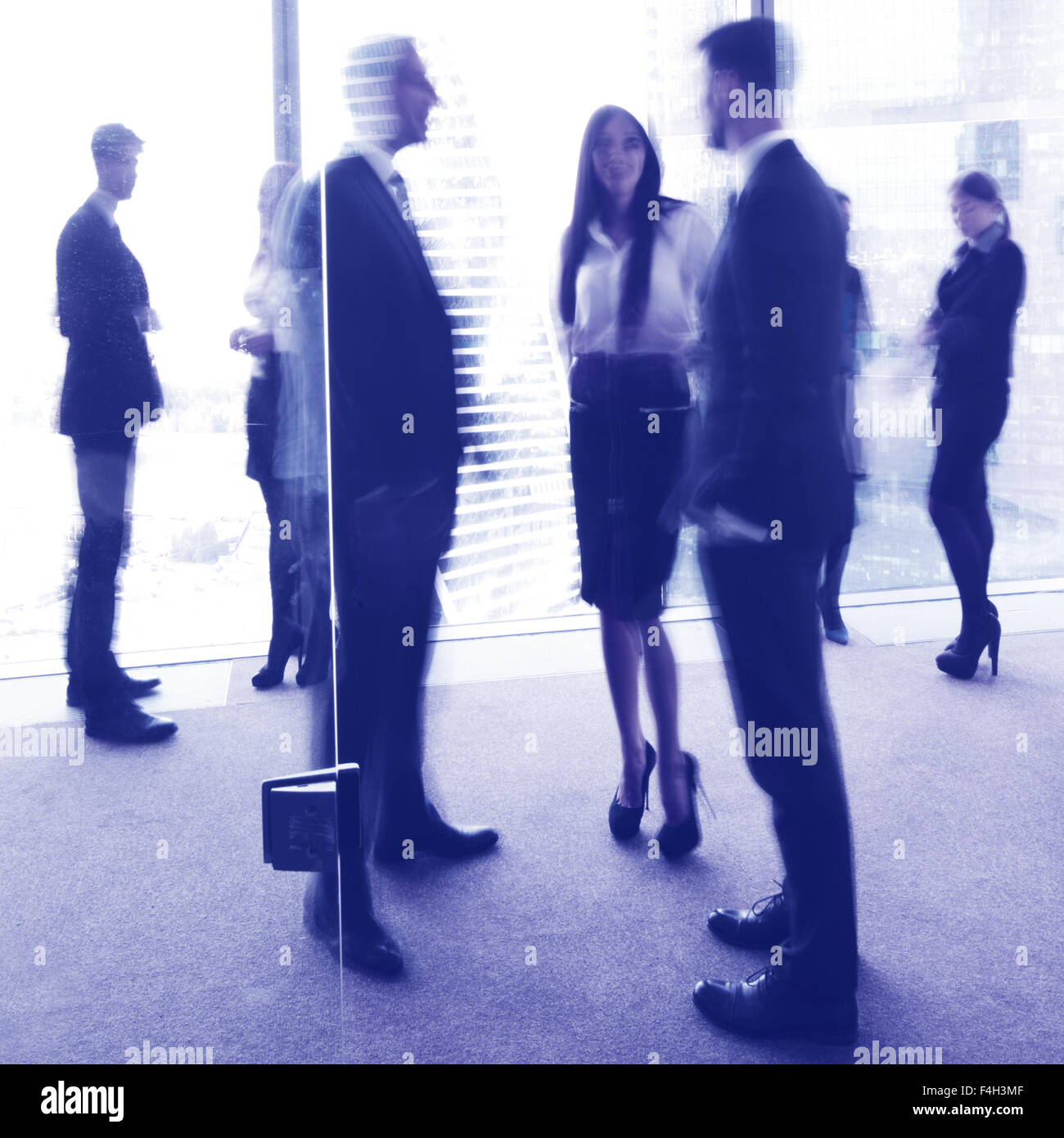 Business people talking in a conference room with city skyline Stock ...