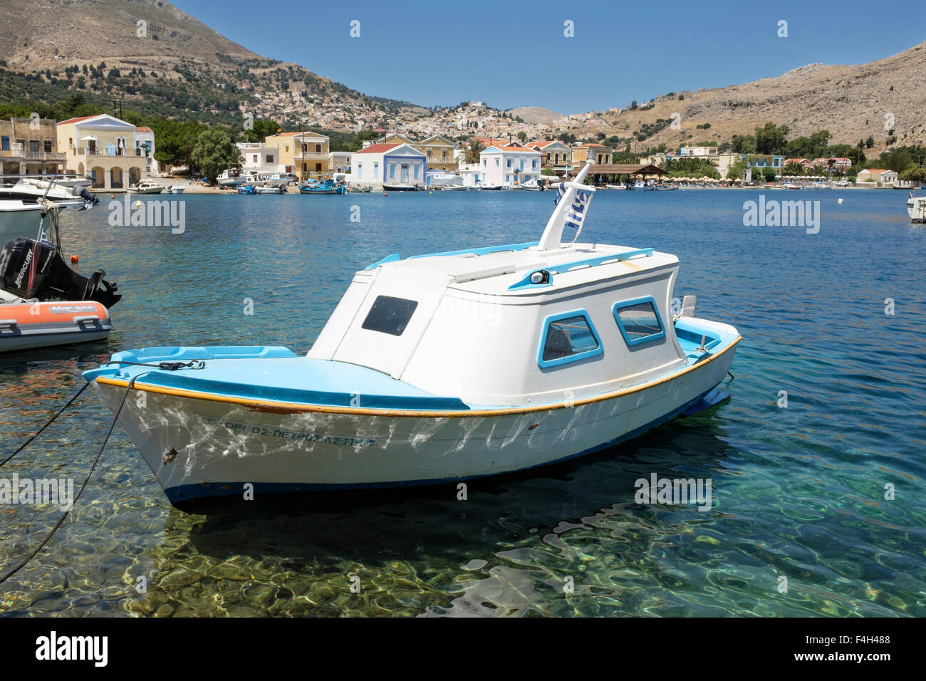 Fishing boats in Pedi bay on the Greek island of Symi, Greece Stock ...