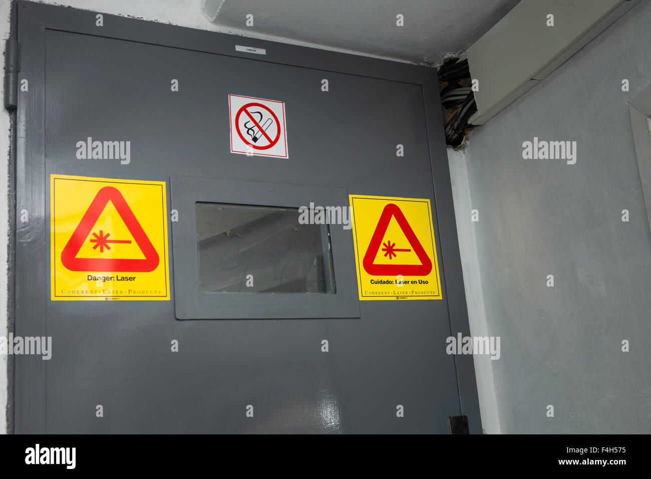 Warning signs that lasers are in use behind the door at the OGS in the ...