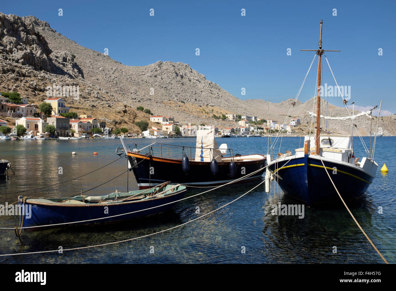 Small greek fishing boats caiques hi-res stock photography and images ...
