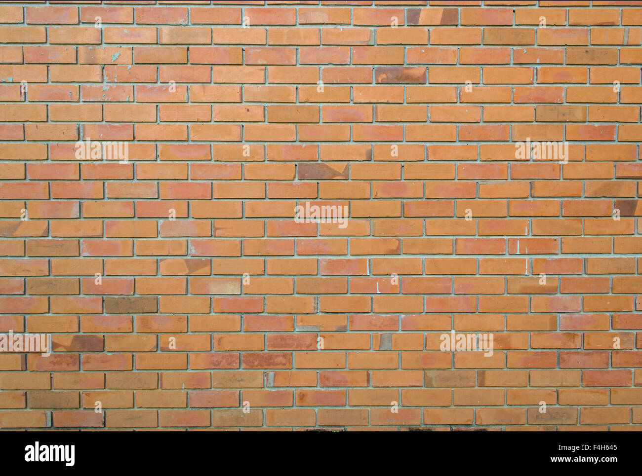 Old walls built with orange brick Stock Photo - Alamy