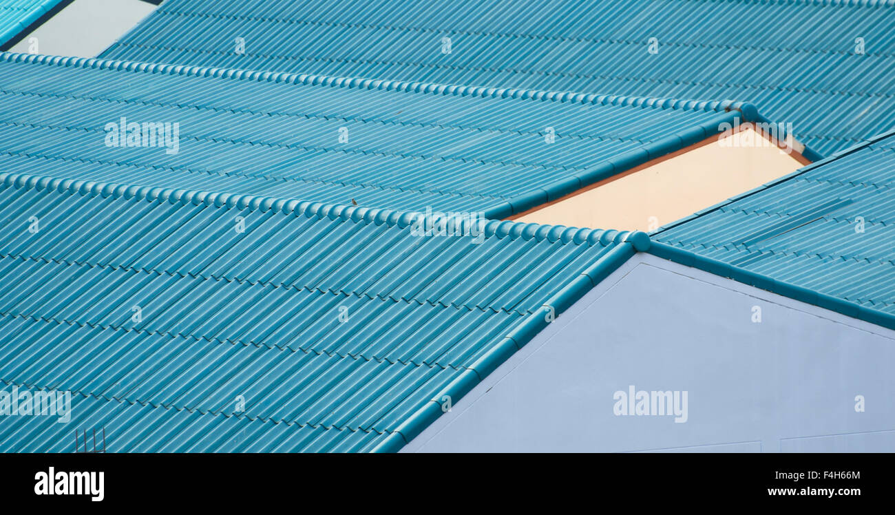 Blue roof on a new houses Stock Photo - Alamy