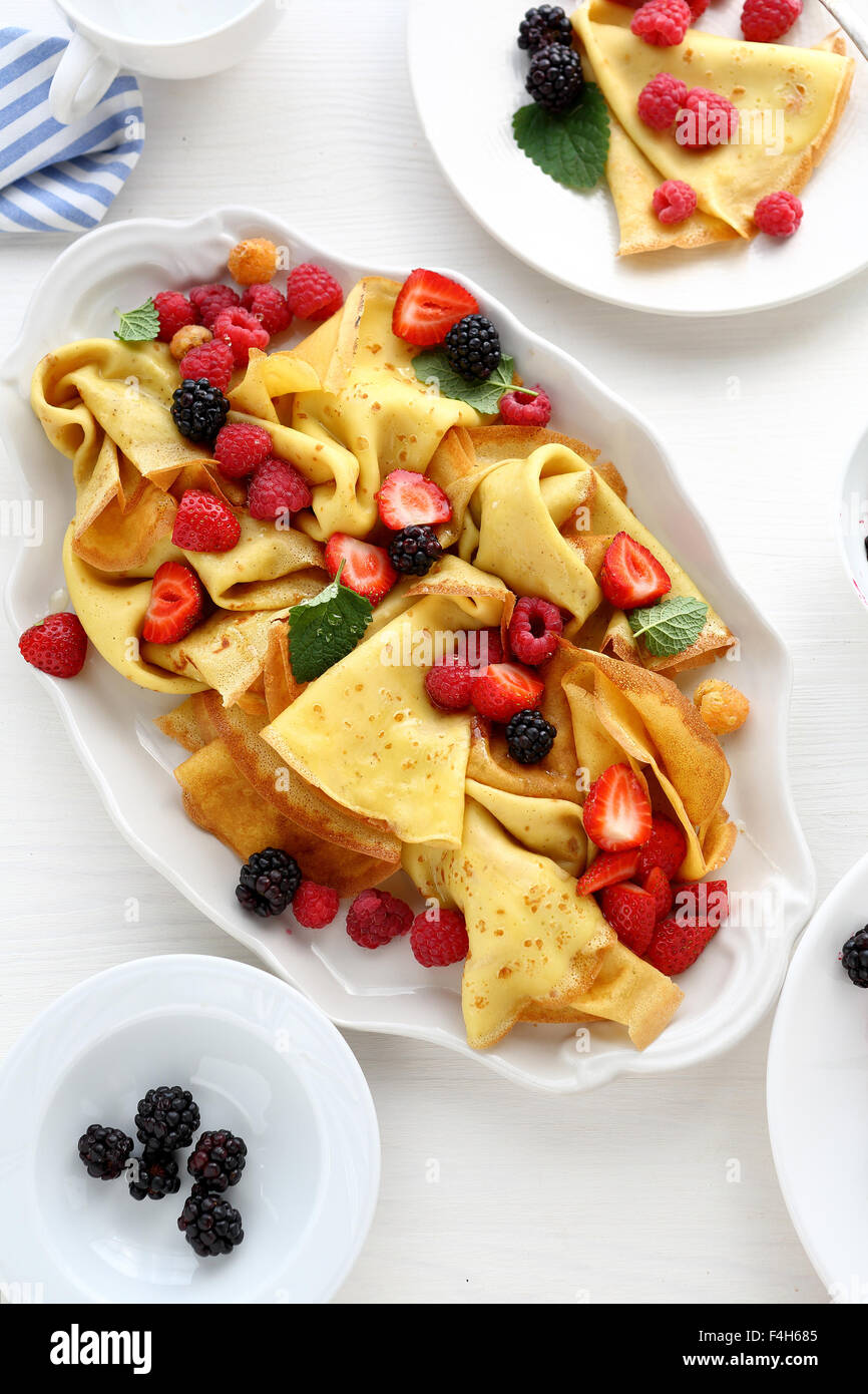 crepes with fresh berries and honey, top view Stock Photo - Alamy