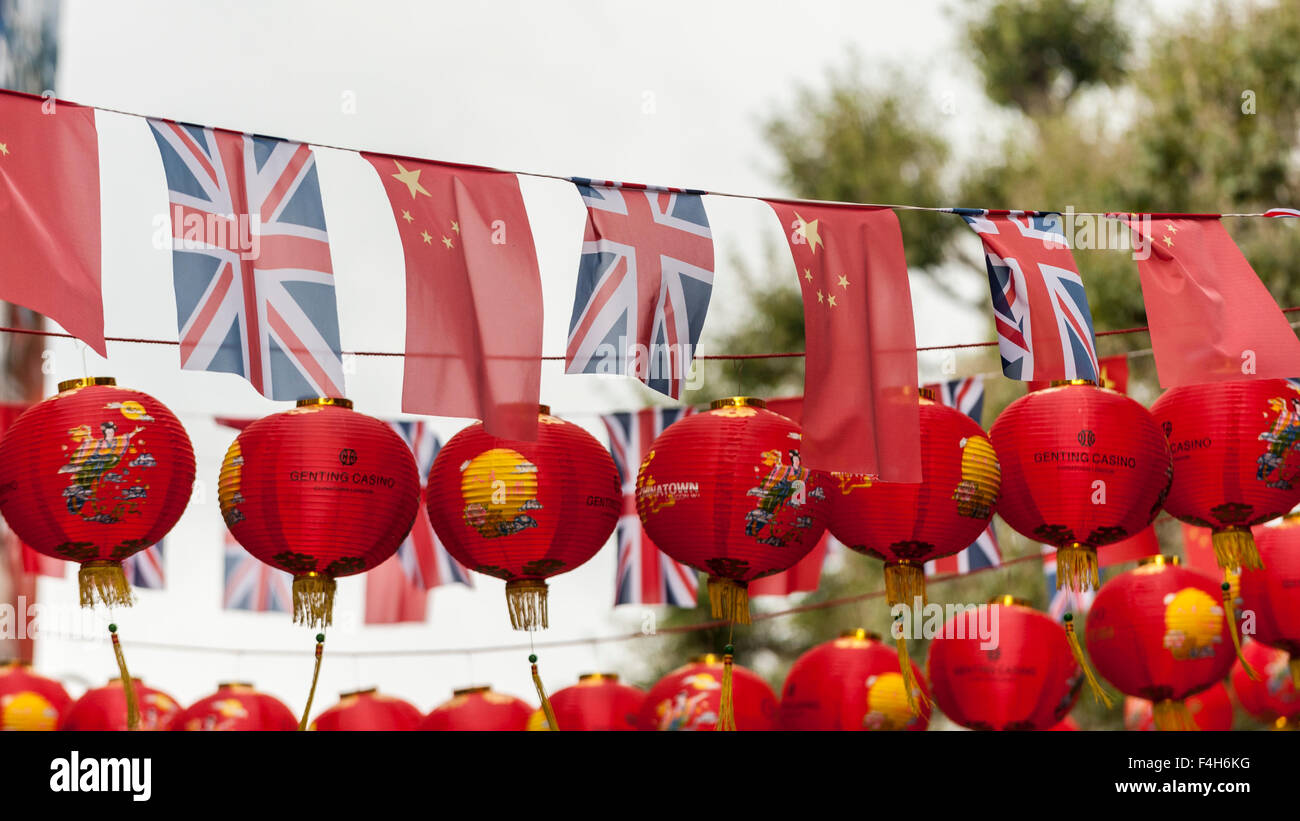 London, UK. 18 October 2015. Chinese flags and Union Jack flags hang ...
