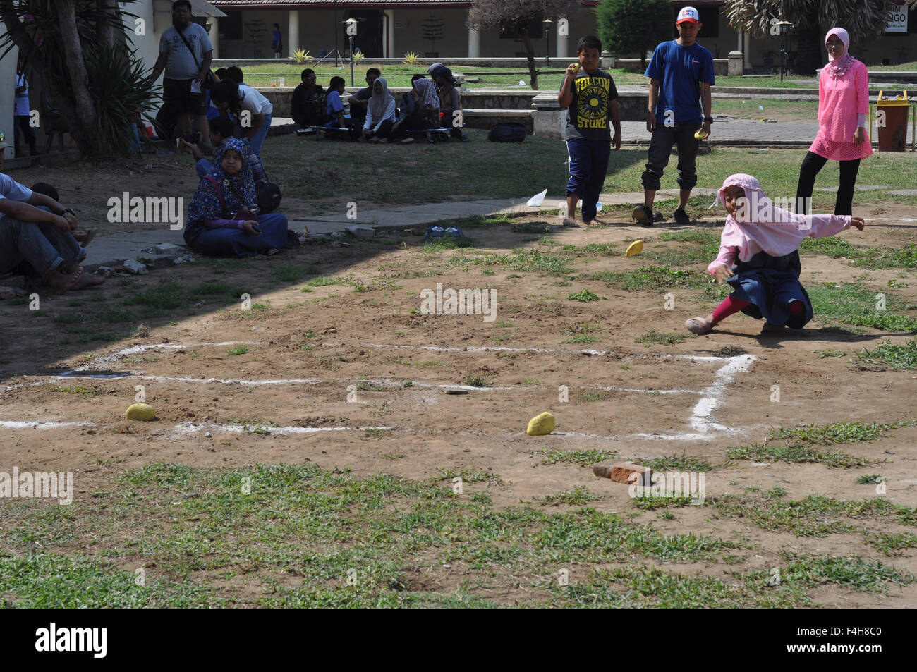 Throwing a rock game High Resolution Stock Photography and Images - Alamy