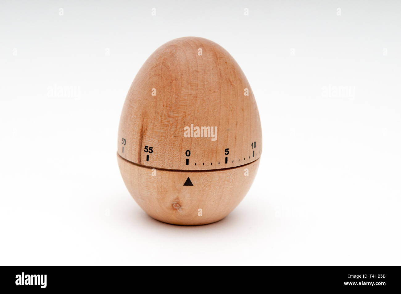 Wooden egg timer on a white background Stock Photo - Alamy