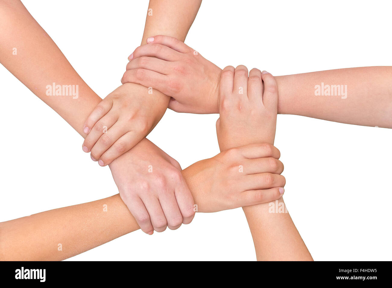 Five arms with hands of girls holding each other joining on white ...