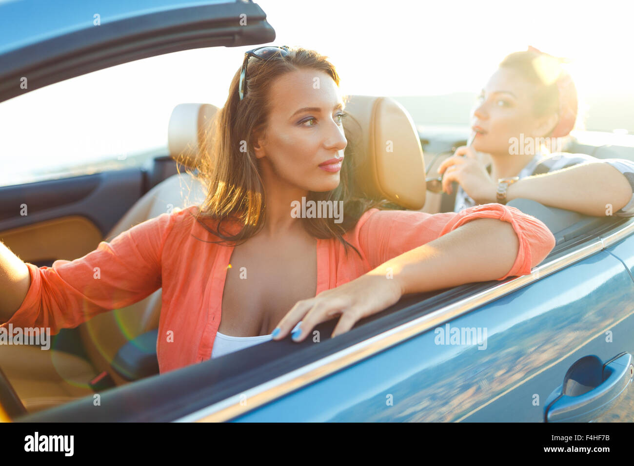 Girls driving convertible hi-res stock photography and images - Alamy