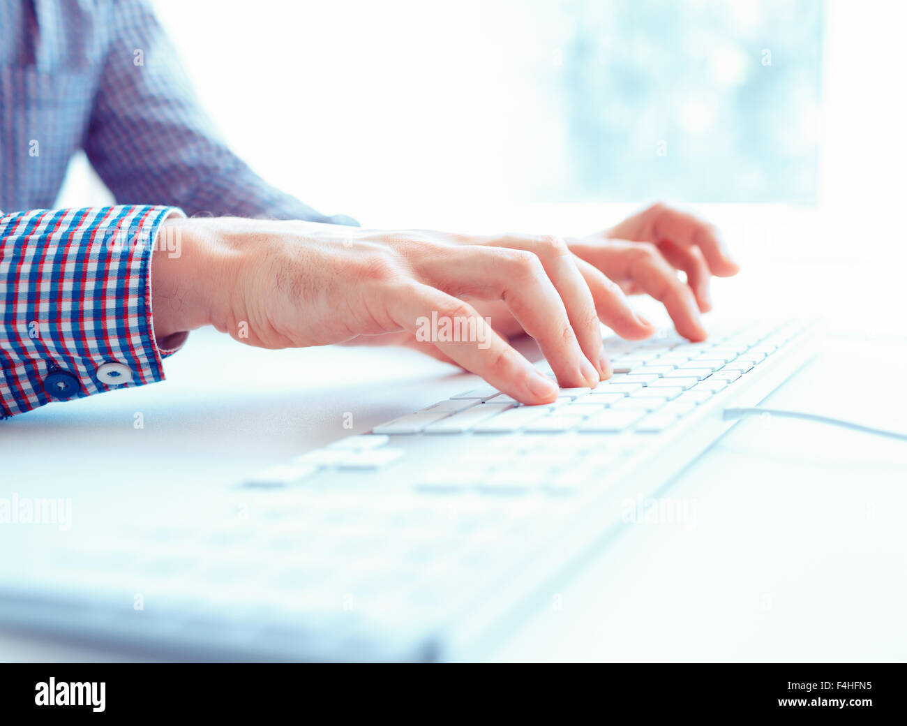 Male hands or men office worker typing on the keyboard Stock Photo - Alamy