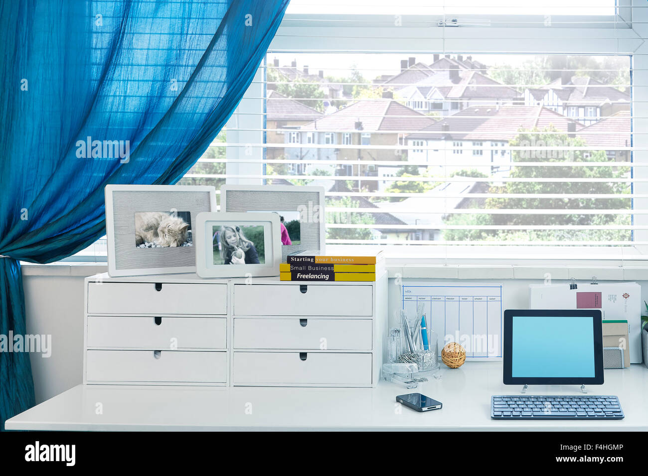 Home and Business office interior set up with a mobile phone and tablet ...