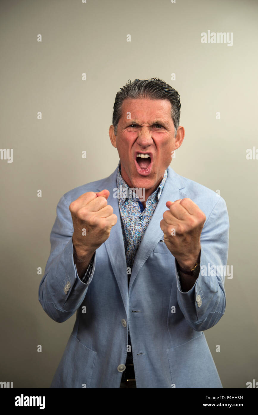 Excited Latin executive Stock Photo - Alamy