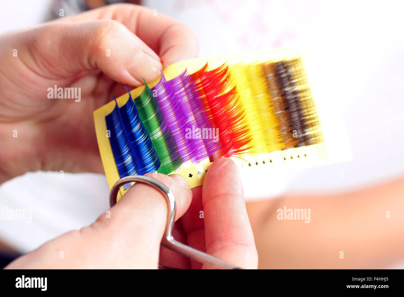 Lash making process, eyelashes set extension in stylist hands, closeup ...
