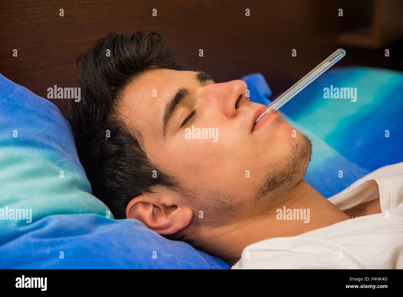 Fever thermometer mouth man hi-res stock photography and images - Alamy