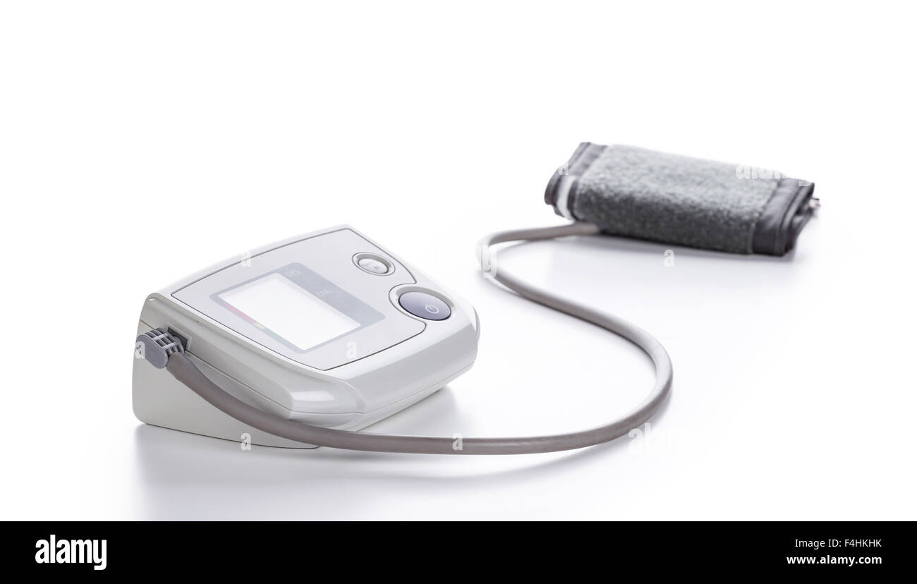 Digital Blood Pressure Monitor closeup on white background Stock Photo ...